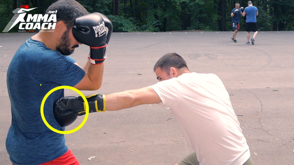 MMA Body Shot – The Cross